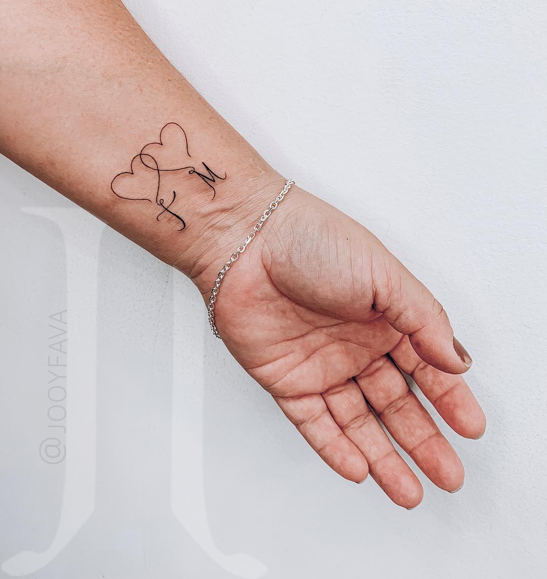 Tatuaje Corazones De Enamorados Con Iniciales Por Jooy Fava Tatuajes Para Mujeres